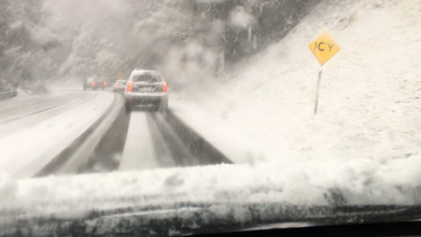 Drive through Crestline during March snow - KESQ